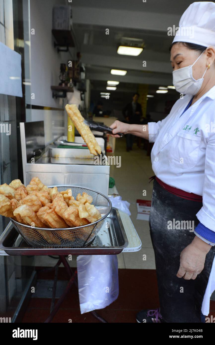 Chinese fried bread - Youtiao sold in almost every neighborhood in ...