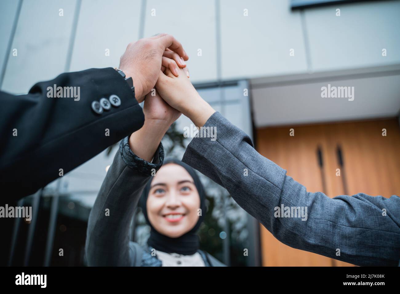 muslim business teamwork Join Hands Support Together showing unity ...