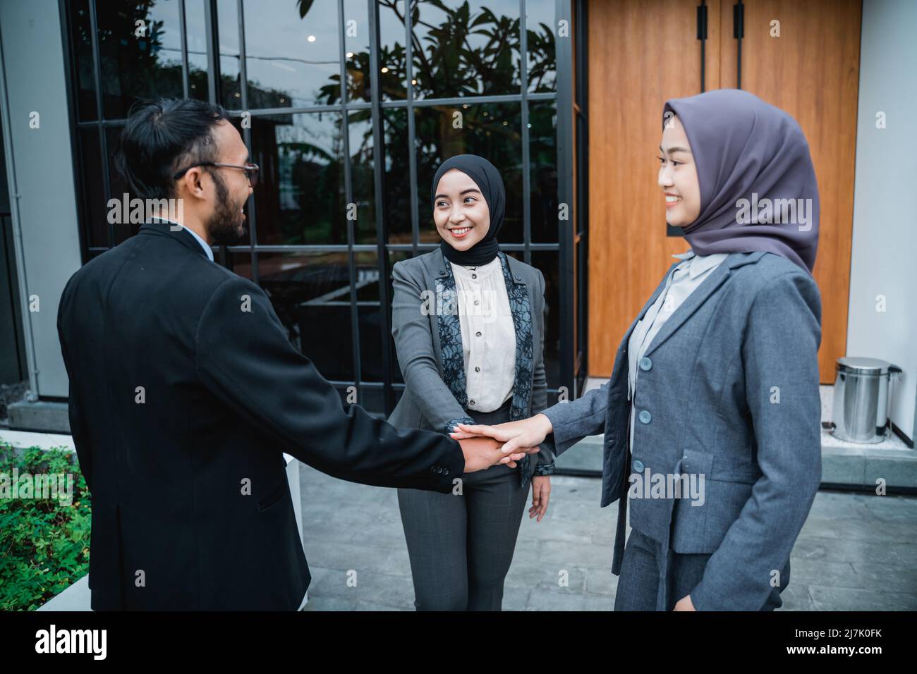 muslim business teamwork Join Hands Support Together showing unity ...