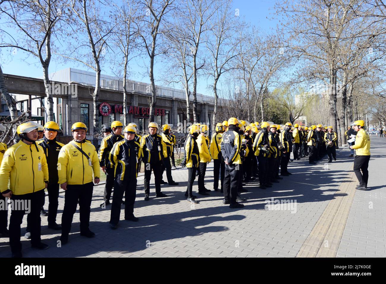 Chinese workers in their morning discipline routine. Beijing, China ...