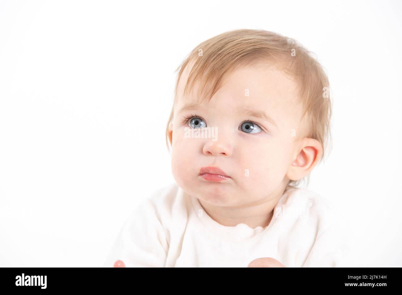 Stock studio photo with the white background of a baby's face Stock ...