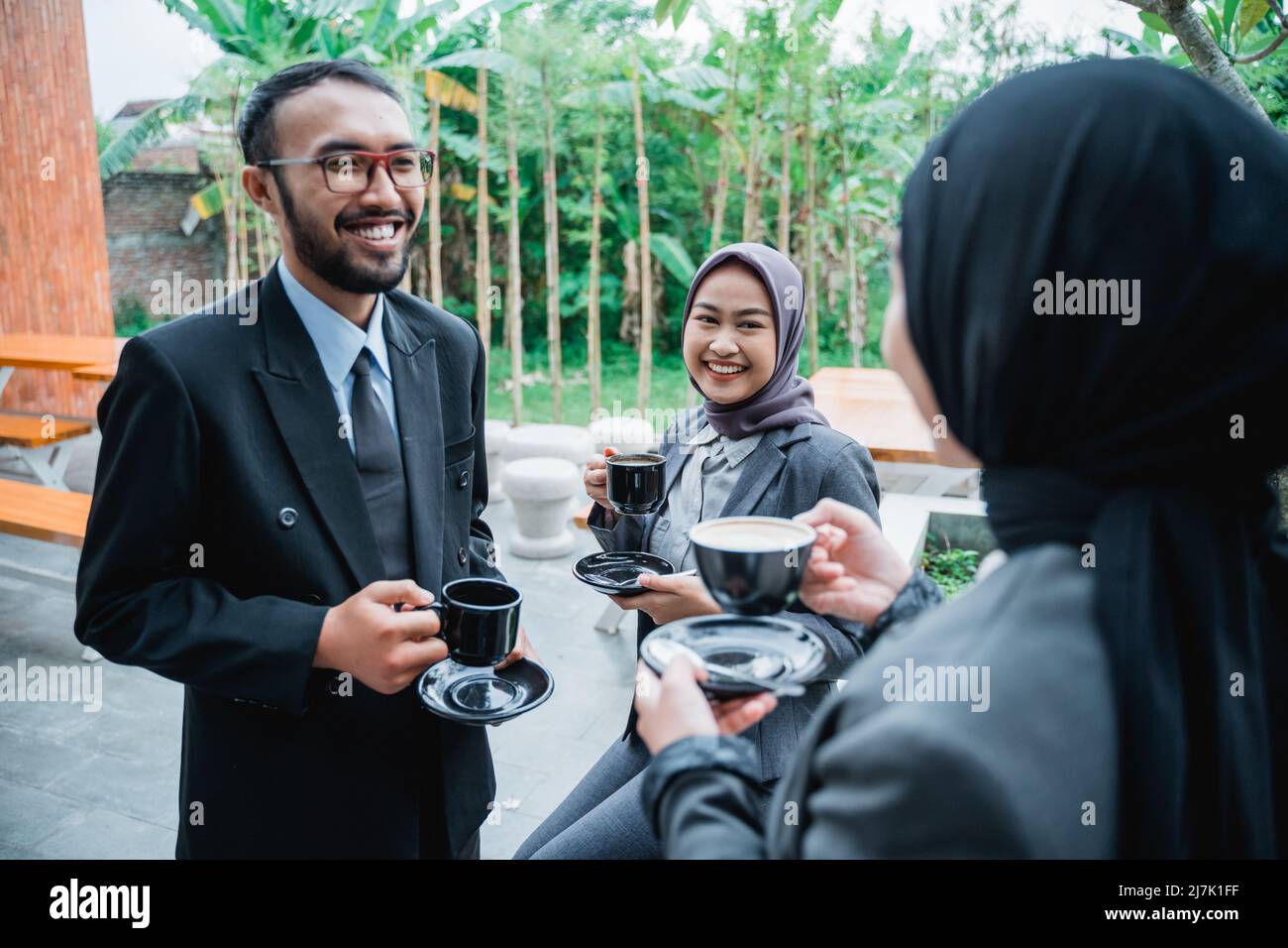 asian business people having conversation during working break Stock ...