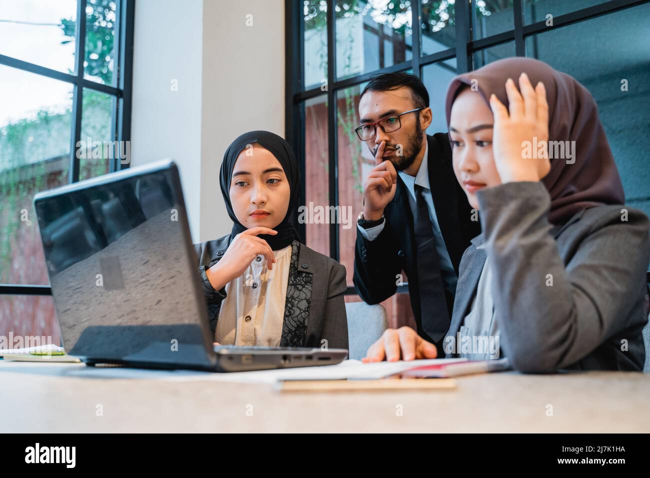 Business people discussing and thinking about project idea at the ...