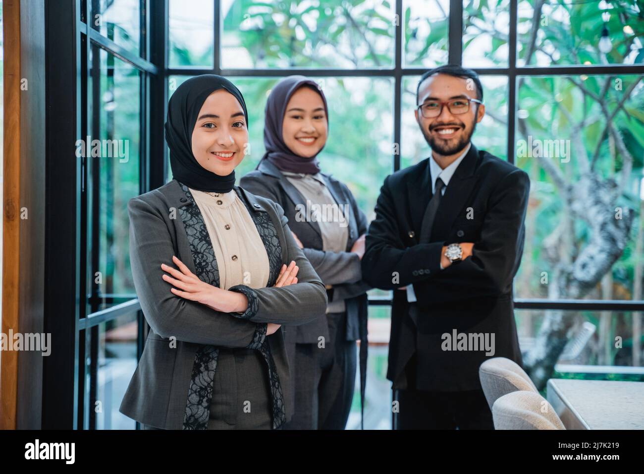 muslim businesswoman leader as she standing in front of her team Stock ...