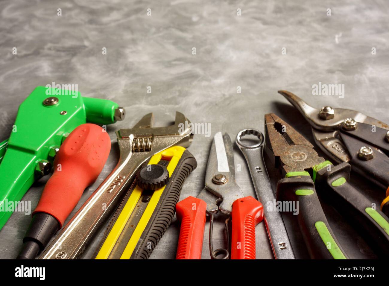 groups of tools with concrete background Stock Photo - Alamy