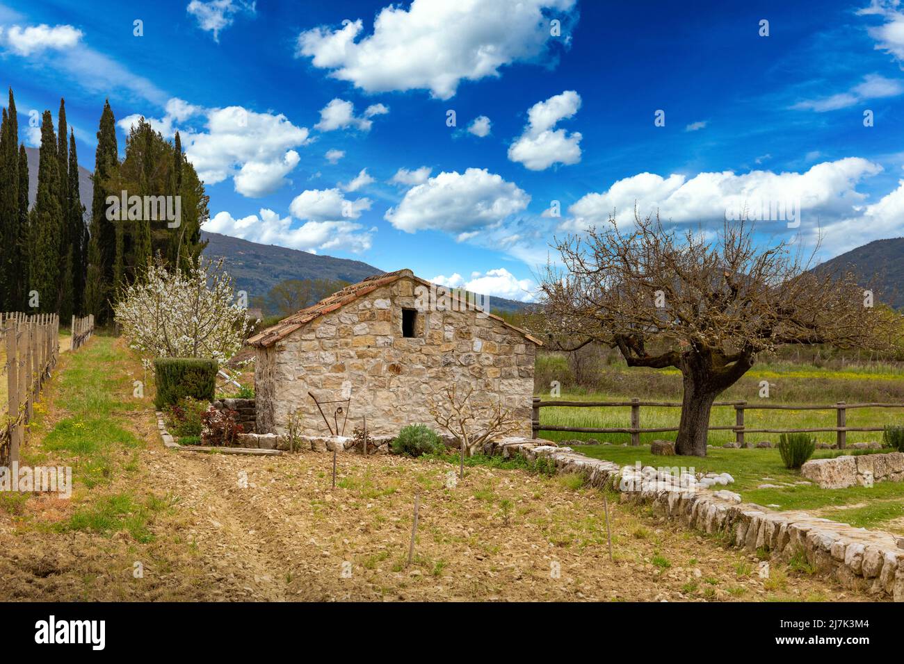 Old stone farm barn in spring vineyard. Europe Stock Photo - Alamy