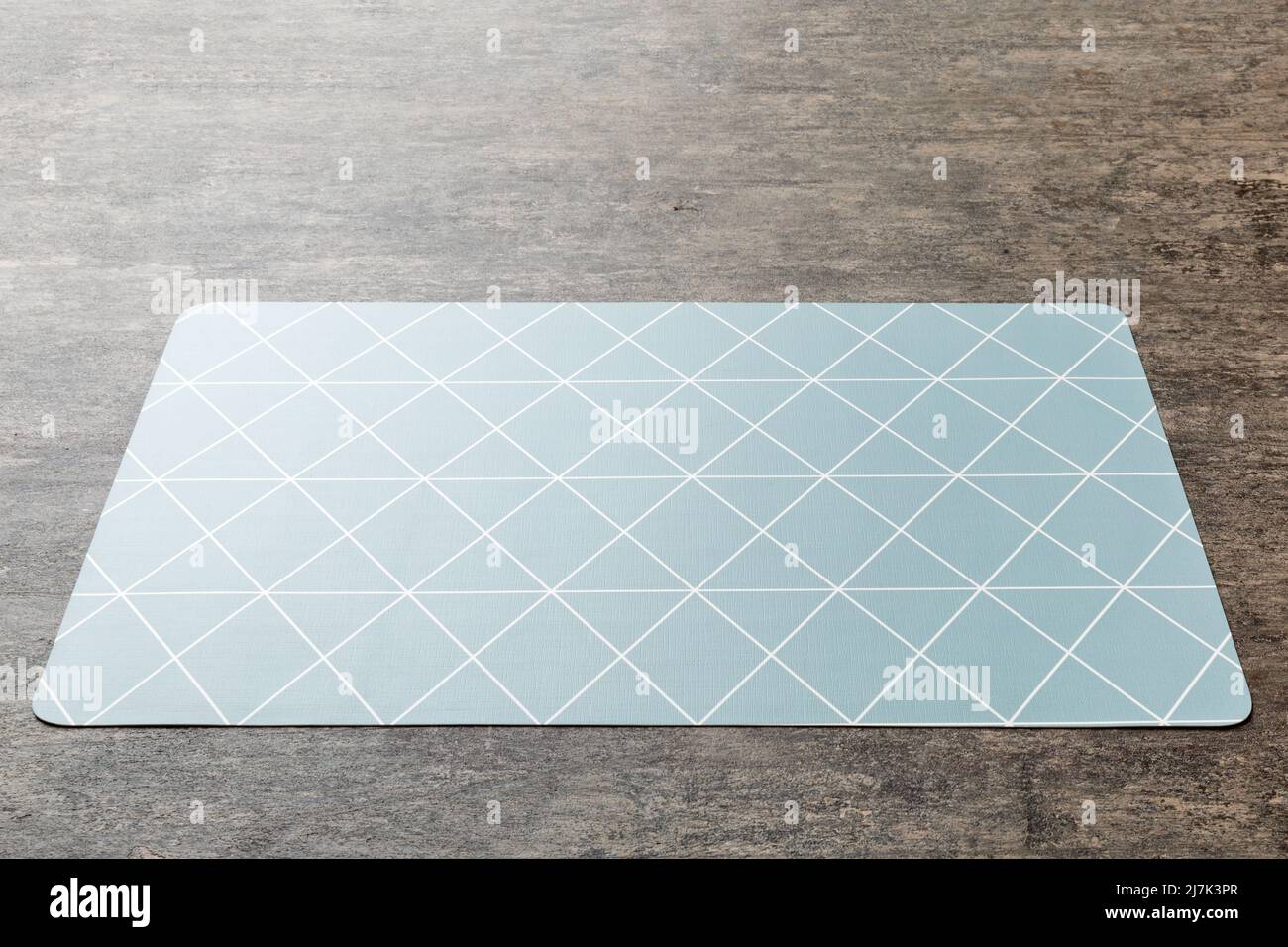 Perspective view of grey tablecloth for food on cement background ...