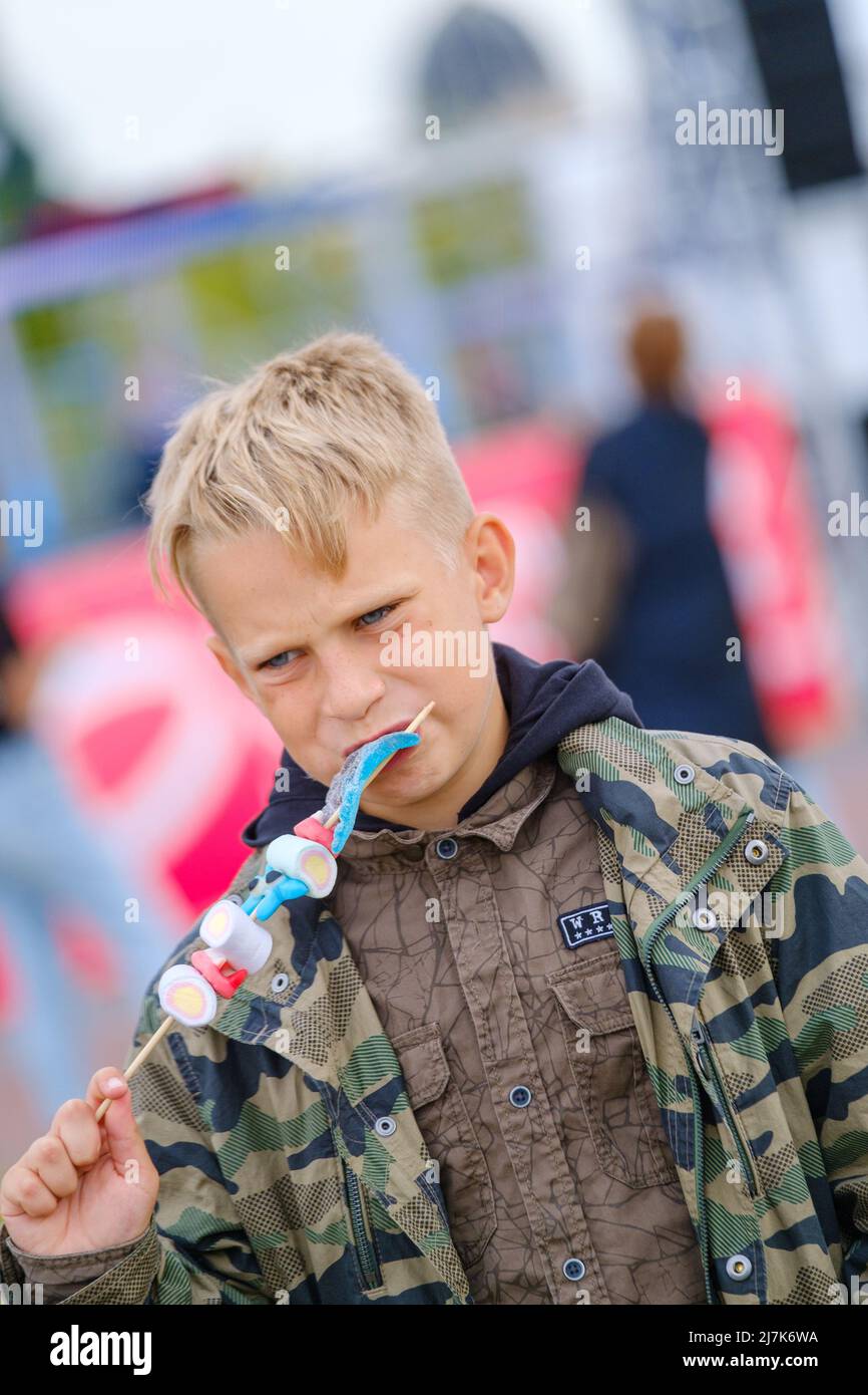 Boy eating jelly skewer on street Stock Photo - Alamy Boy eating jelly skewer on street Stock Photo - Alamy