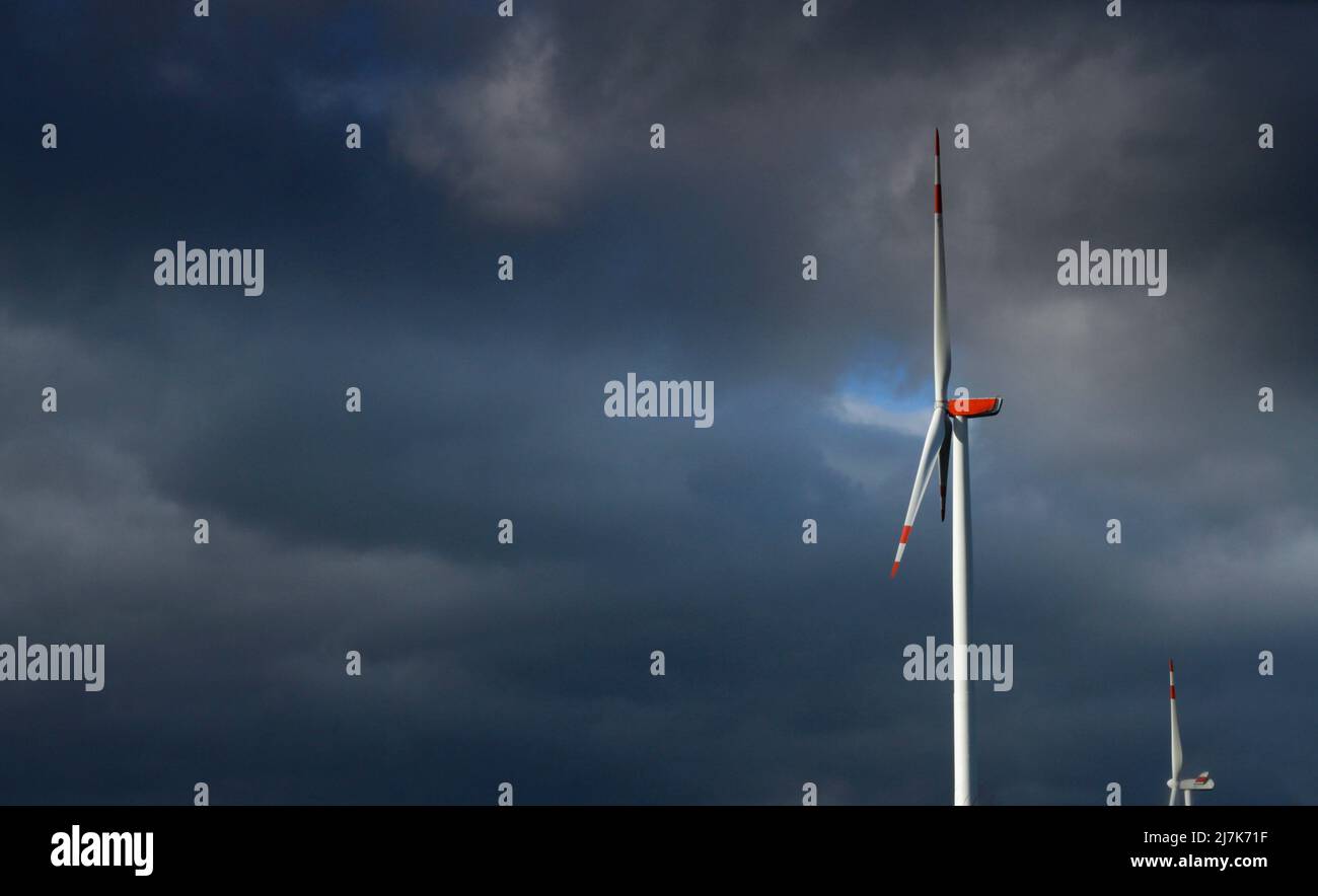 Wind turbine against dramatic sky hi-res stock photography and images ...