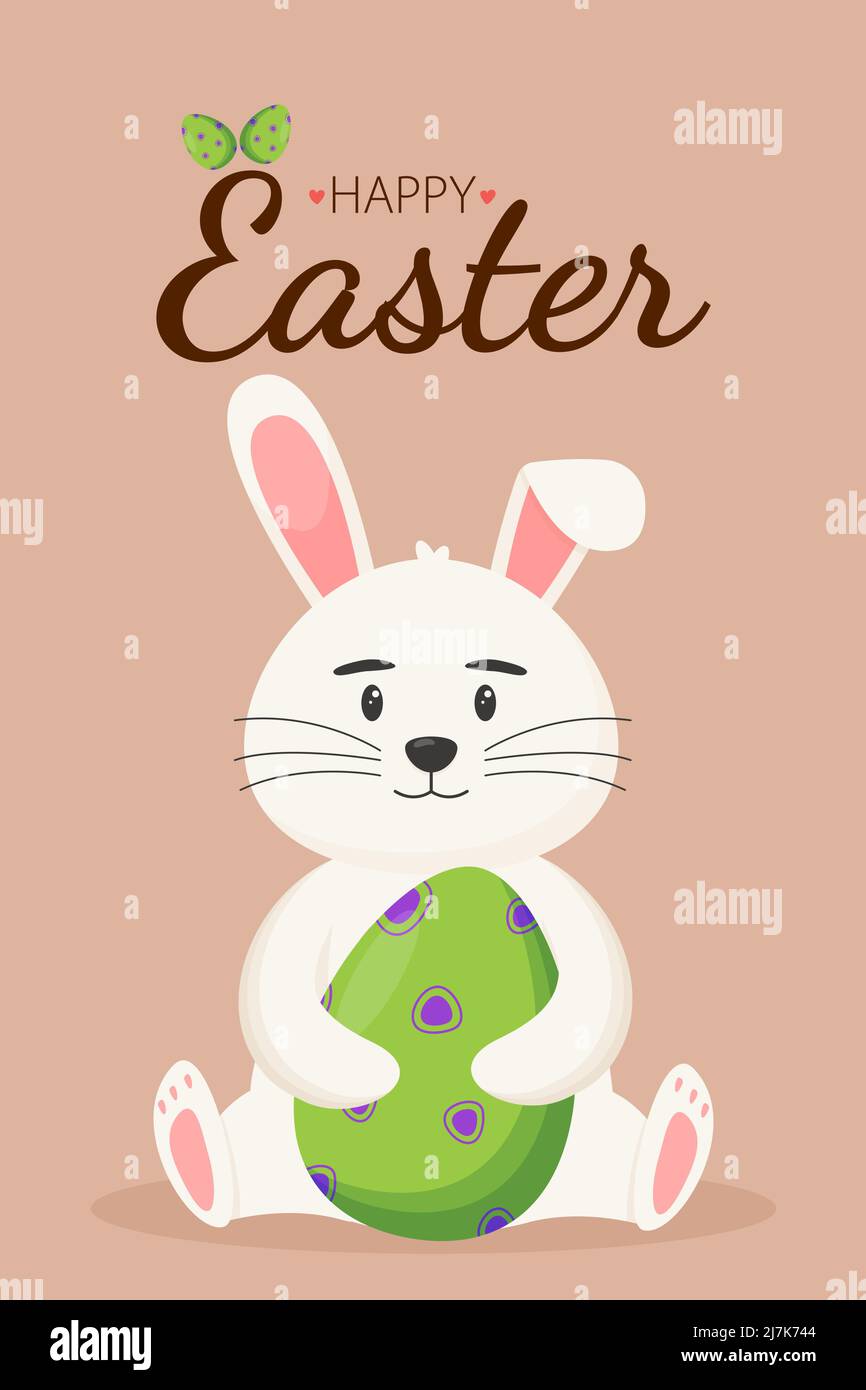 Cute Easter bunny with an Easter egg in its paws. Easter concept. Happy ...