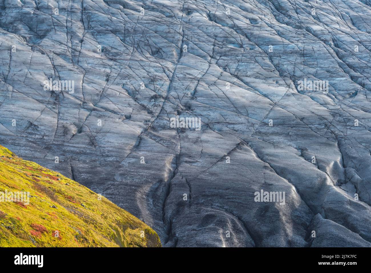 Massive crevassed glacier background texture over the hillside Stock ...