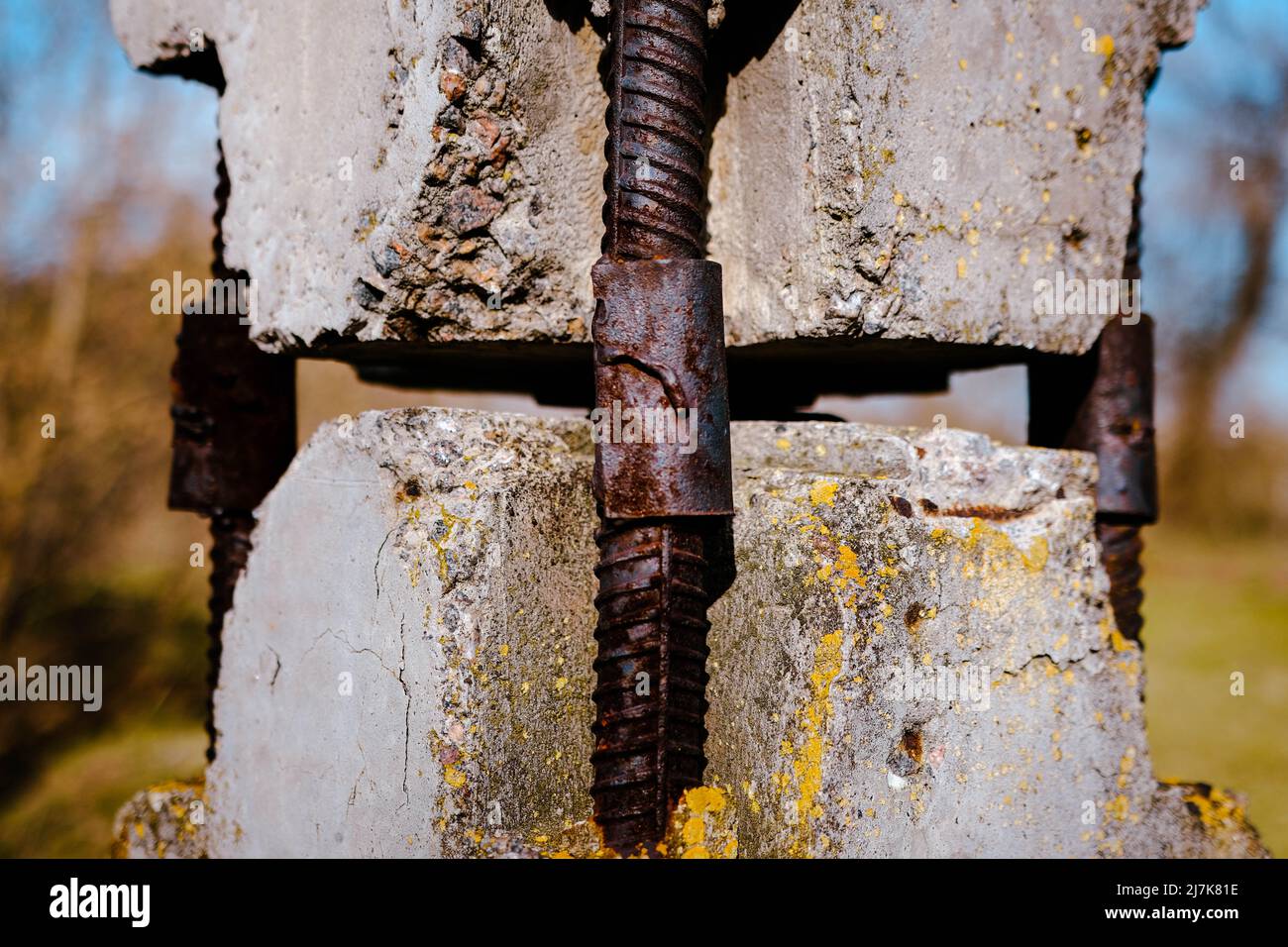 Vintage Old Column with steel fittings and moss Stock Photo - Alamy