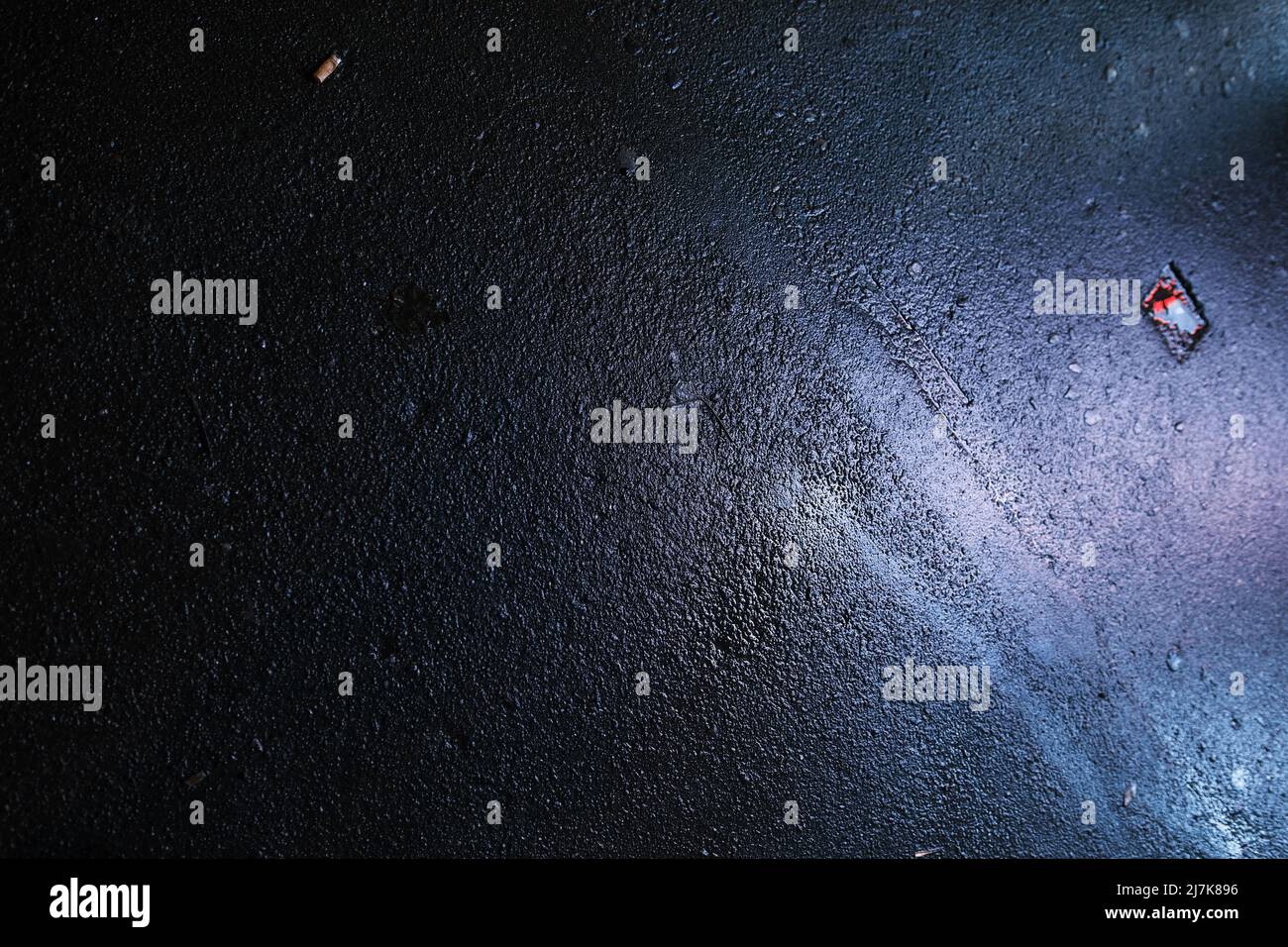 Night road with reflection from the lights Stock Photo - Alamy