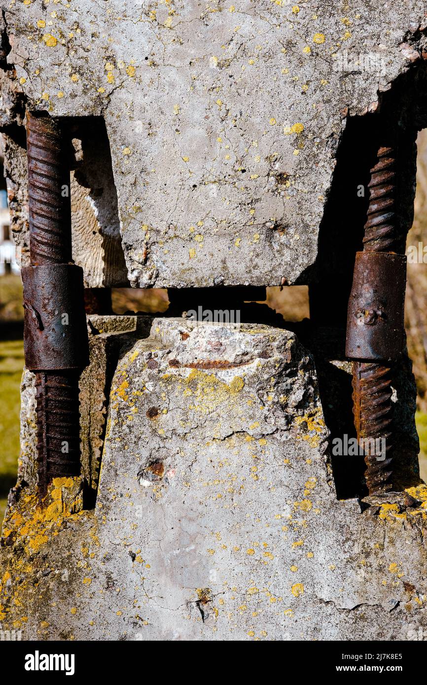 Vintage Old Column with steel fittings and moss Stock Photo - Alamy