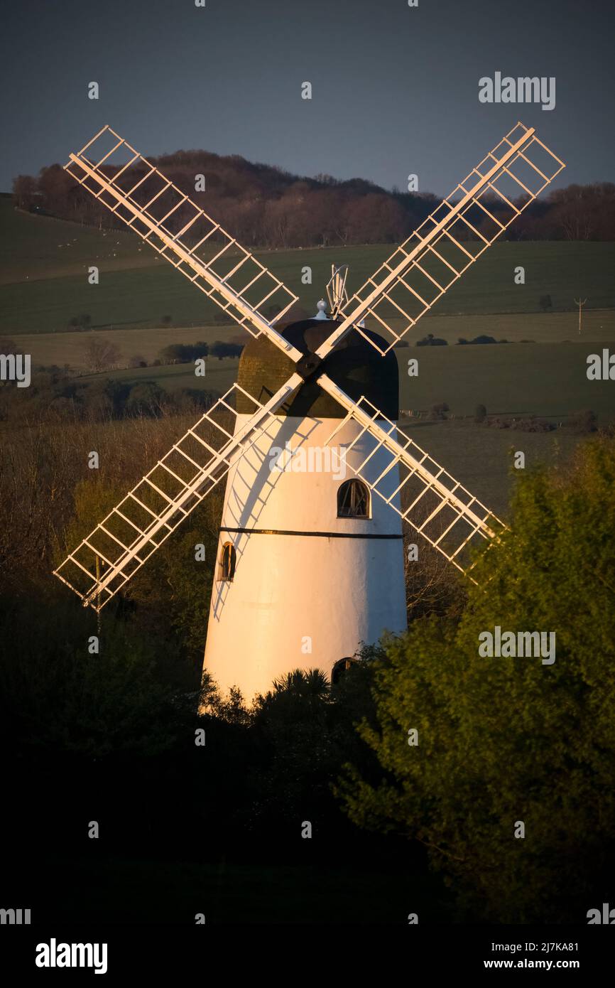 Traditional windmill captured in the golden hour Stock Photo - Alamy
