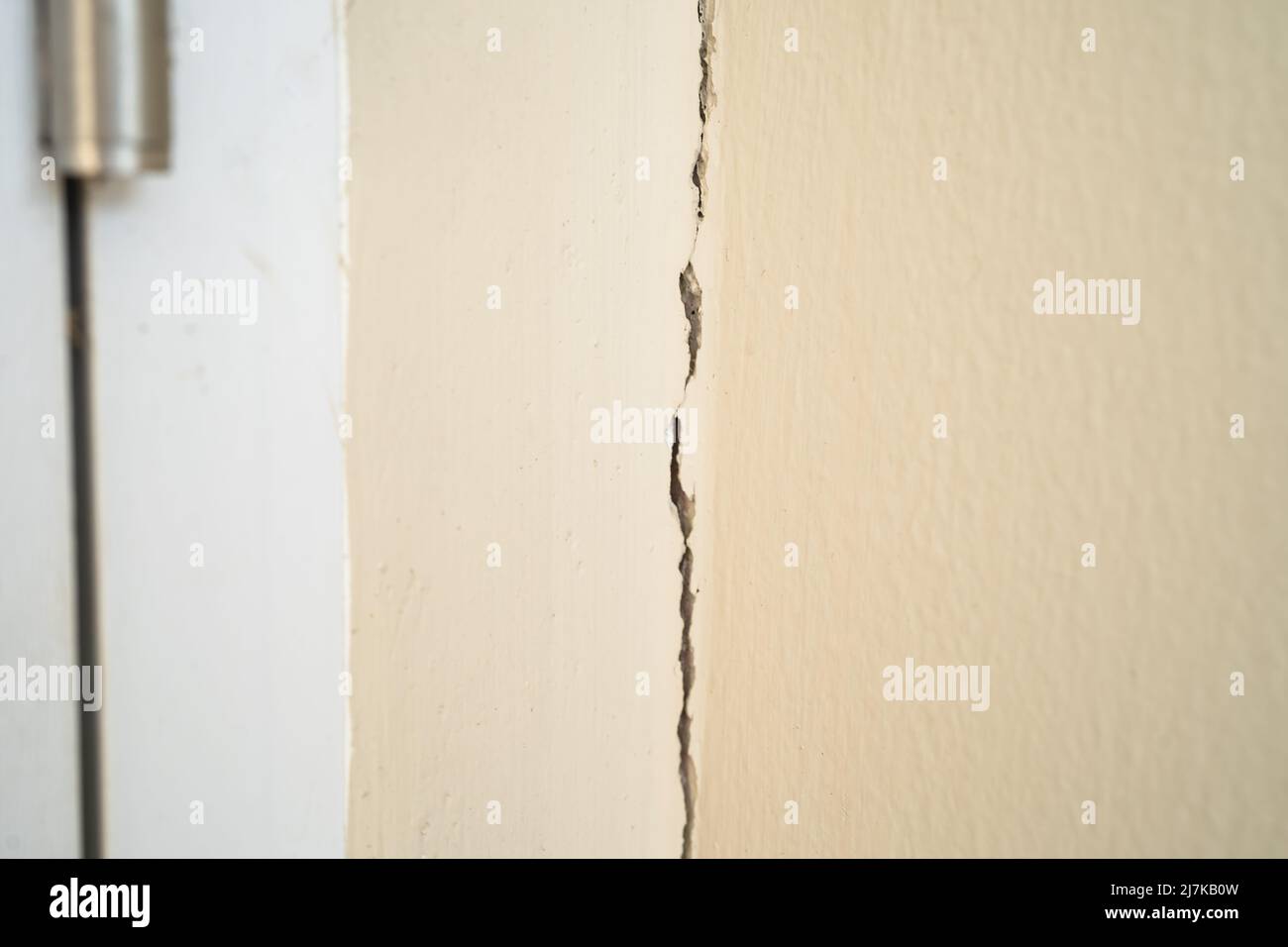 Settlement cracks of cement wall that occur at expansion joints in ...