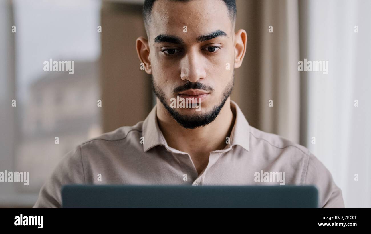 Serious male young hispanic business man investor freelancer agent ...