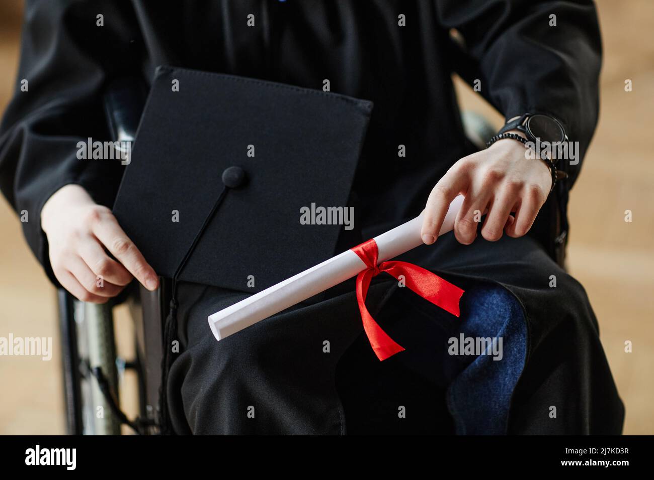 Close up of young man with disability at graduation ceremony in ...