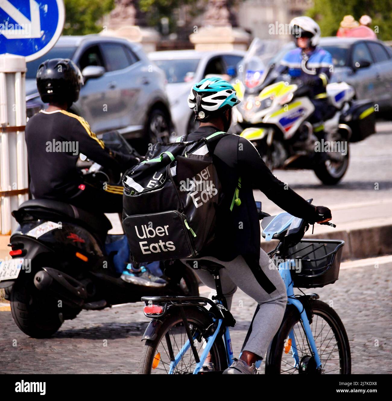 Paris, France, May 9, 2022. Illustration of delivery drivers and VTC ...