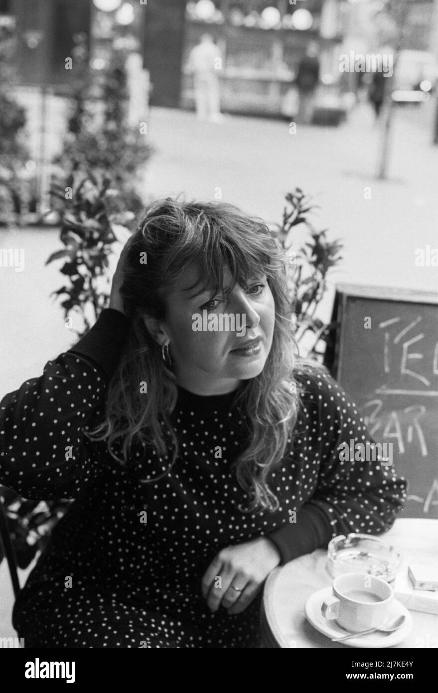 Anne Devlin writer, playwright and screenwriter, sitting in a cafe ...
