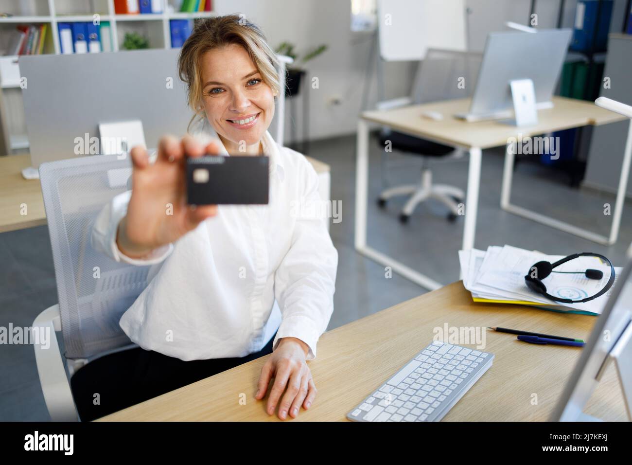 Woman bank service worker hi-res stock photography and images - Alamy