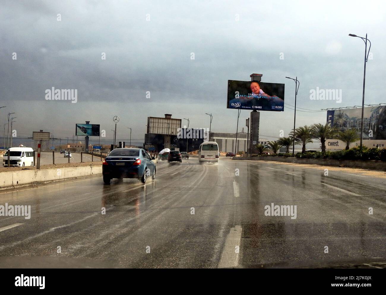 Giza, Egypt, December 30 2021: raining weather, traffic on a cloudy day ...