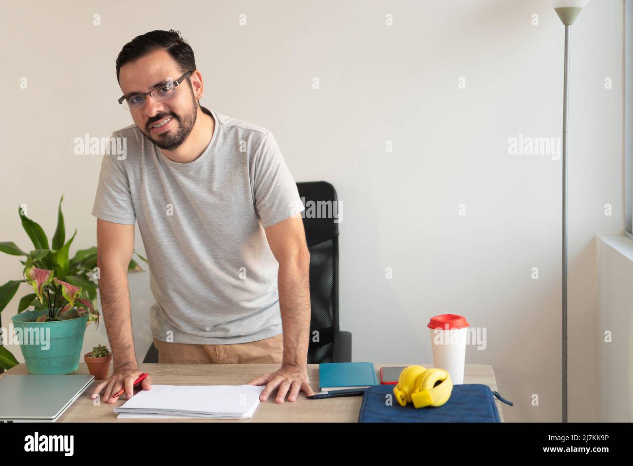 Man cheerful documents work home hi-res stock photography and images ...