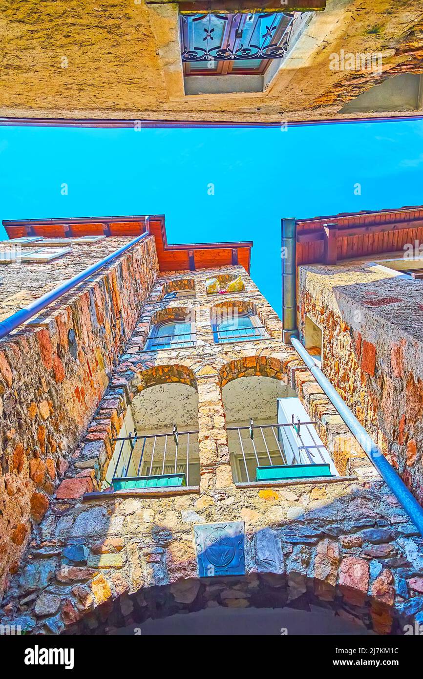 The blue sky through the narrow gap between the houses, Morcote ...