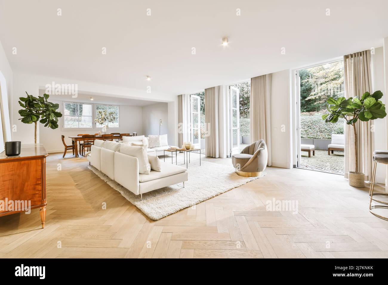 Interior of spacious contemporary living room with large comfortable ...