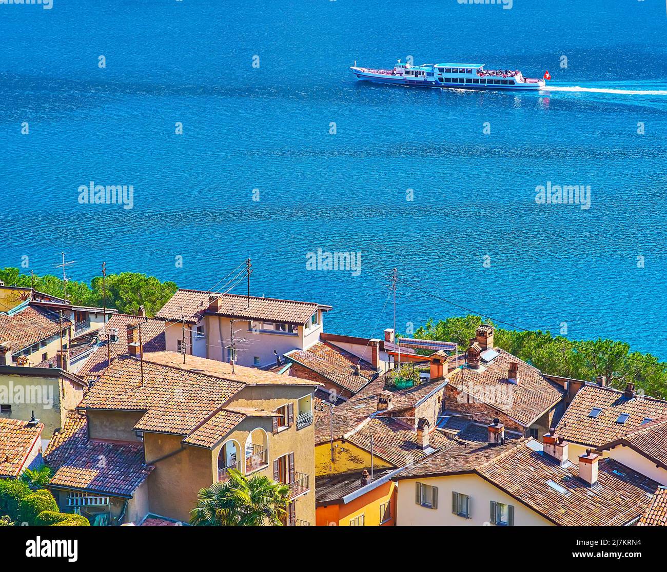 The view from the hill on the floating ferry on Lake Lugano and the ...
