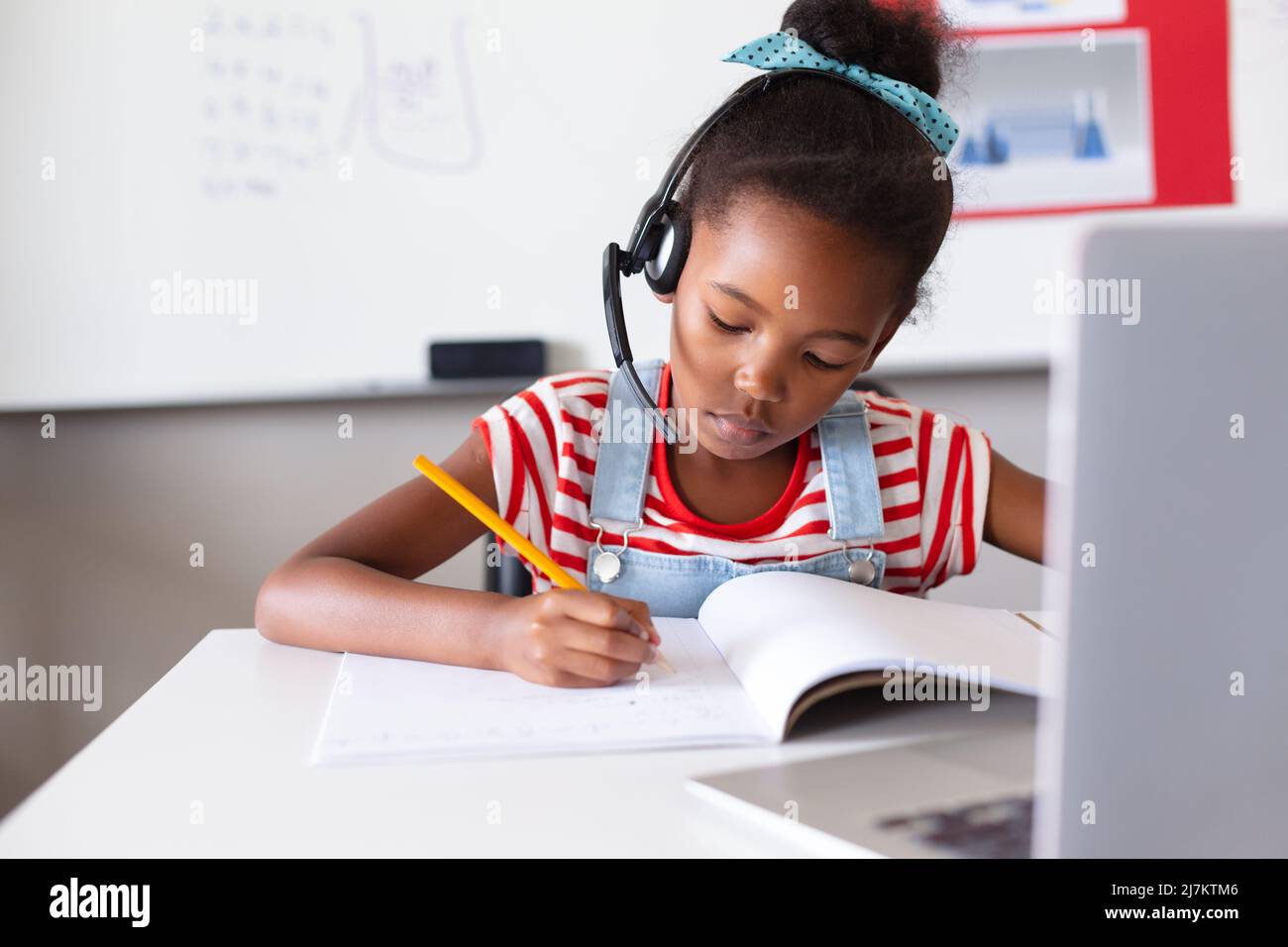 Headphone classroom book hi-res stock photography and images - Alamy