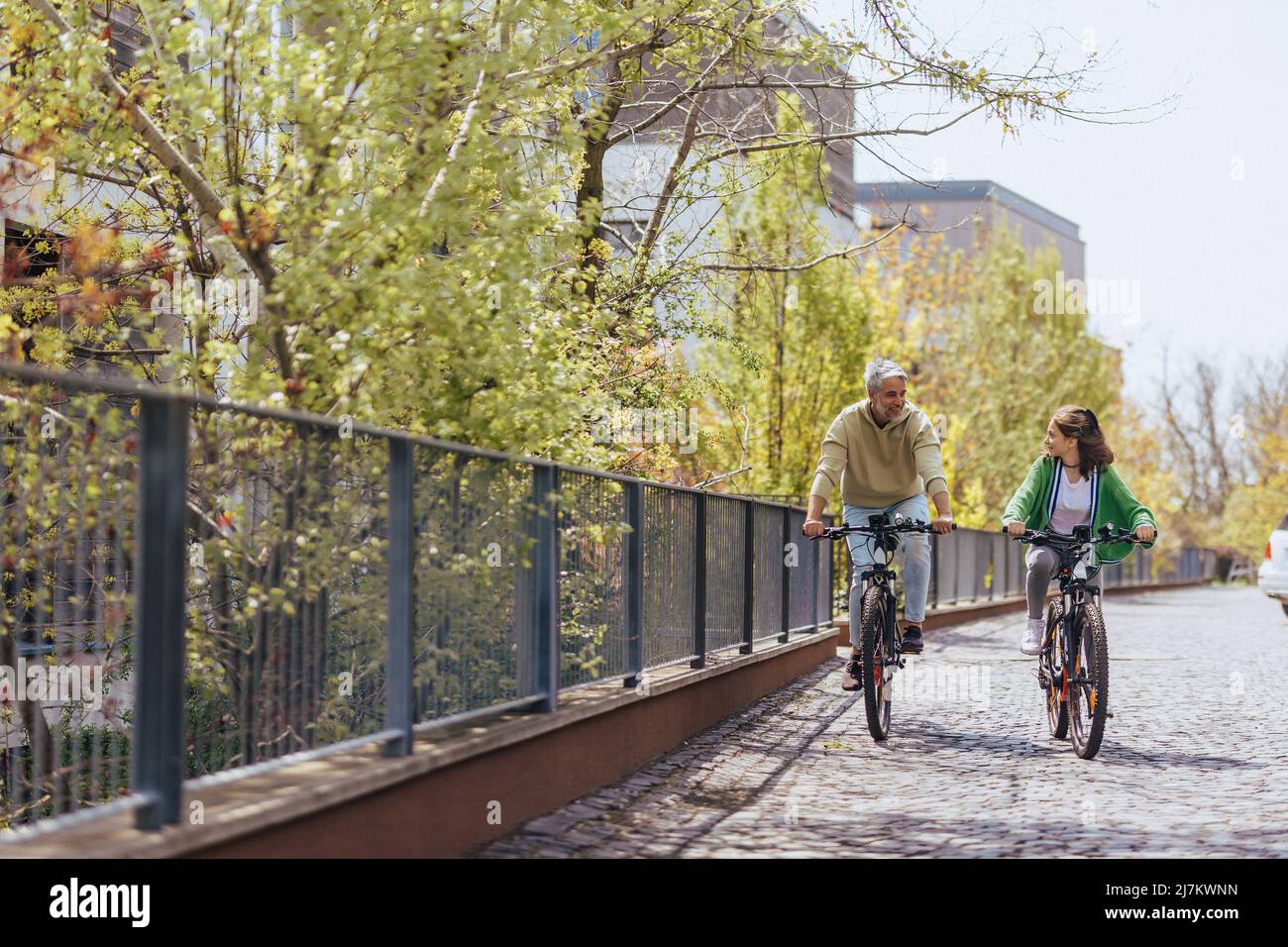 Family cycling park teenage hi-res stock photography and images - Alamy