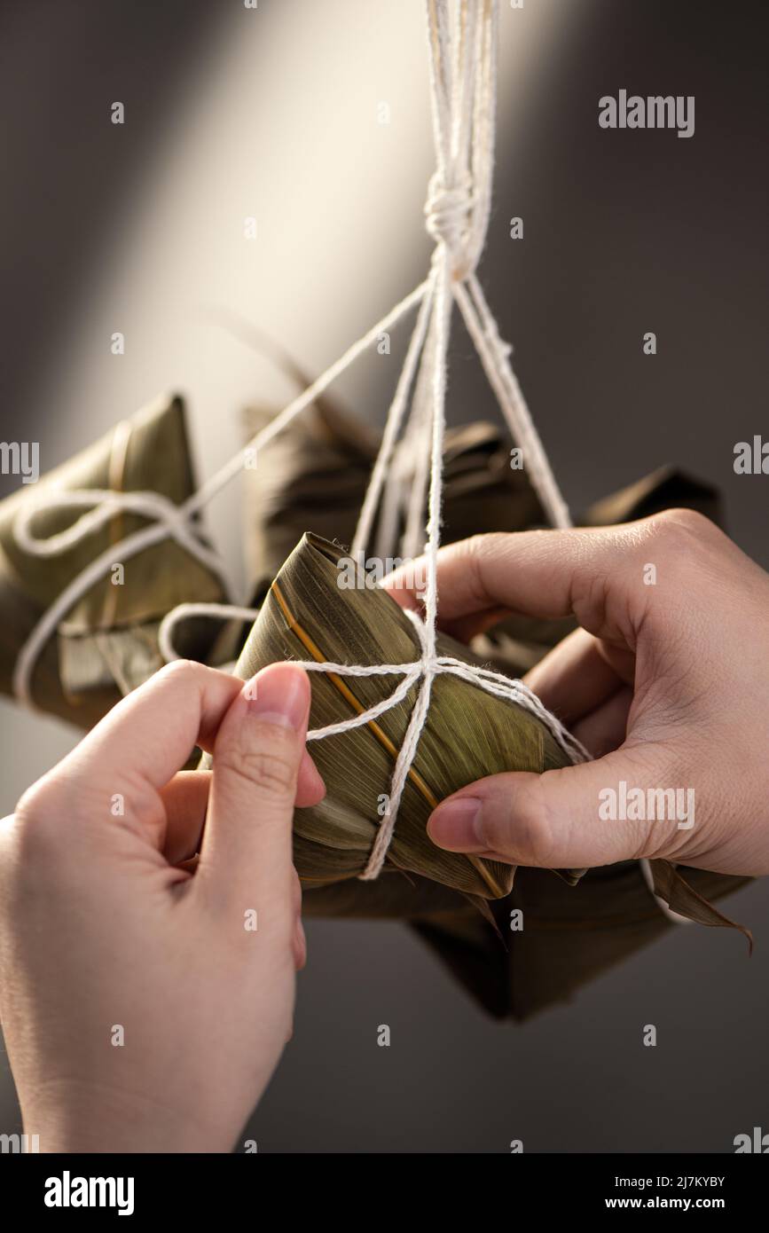 Making zongzi food - wrapping Chinese rice dumpling at home for Duanwu ...