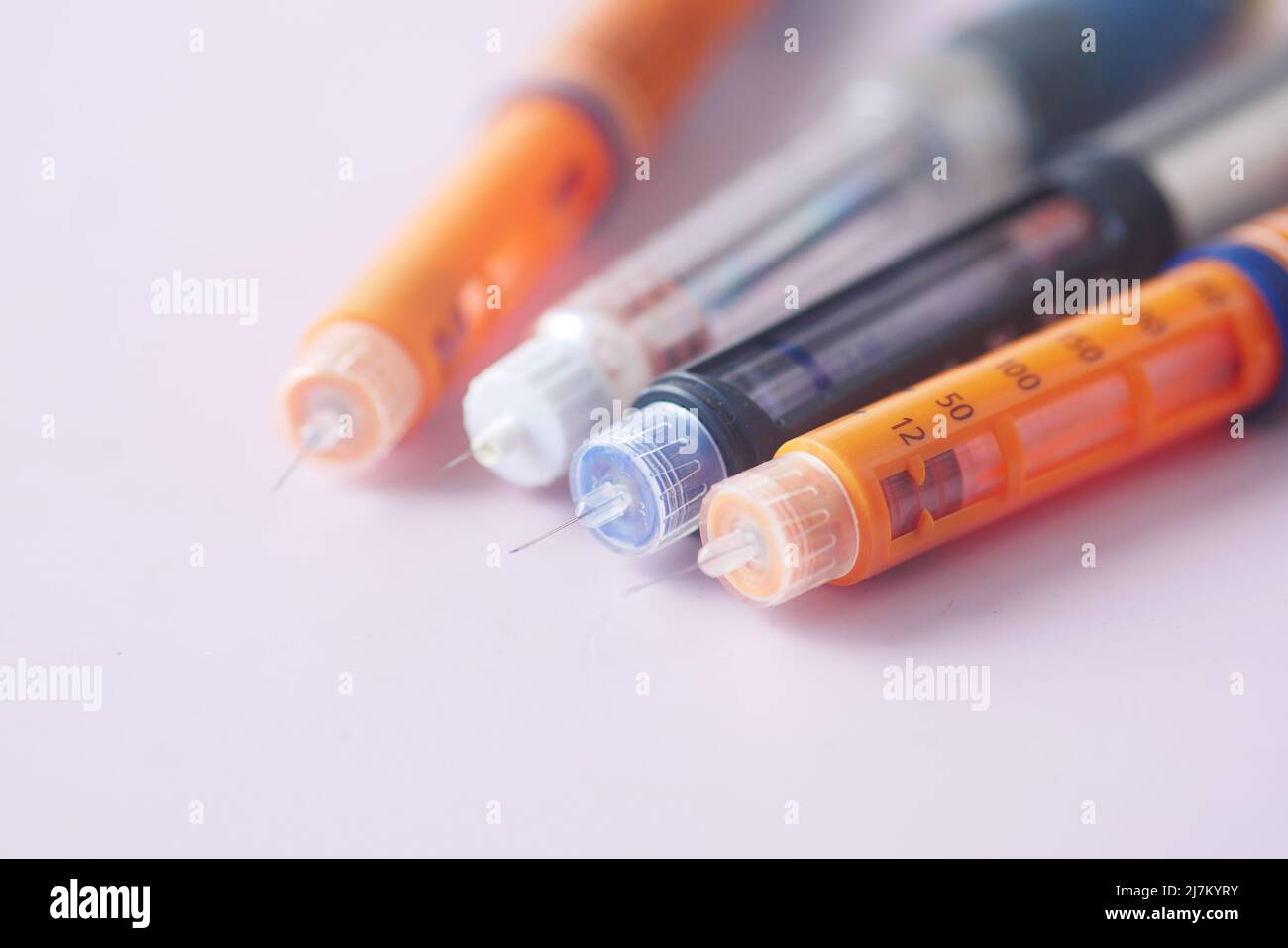 Insulin pens on color background, close up Stock Photo - Alamy