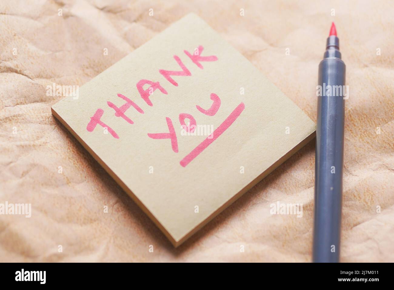 thank you message on a sticky note on old paper Stock Photo - Alamy