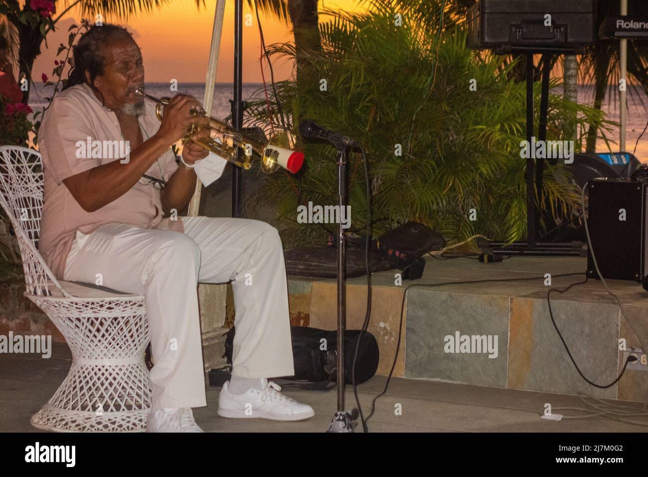 Frank Aird 'The Trumpet Man of Jamaica' playing in Negril sunset ...