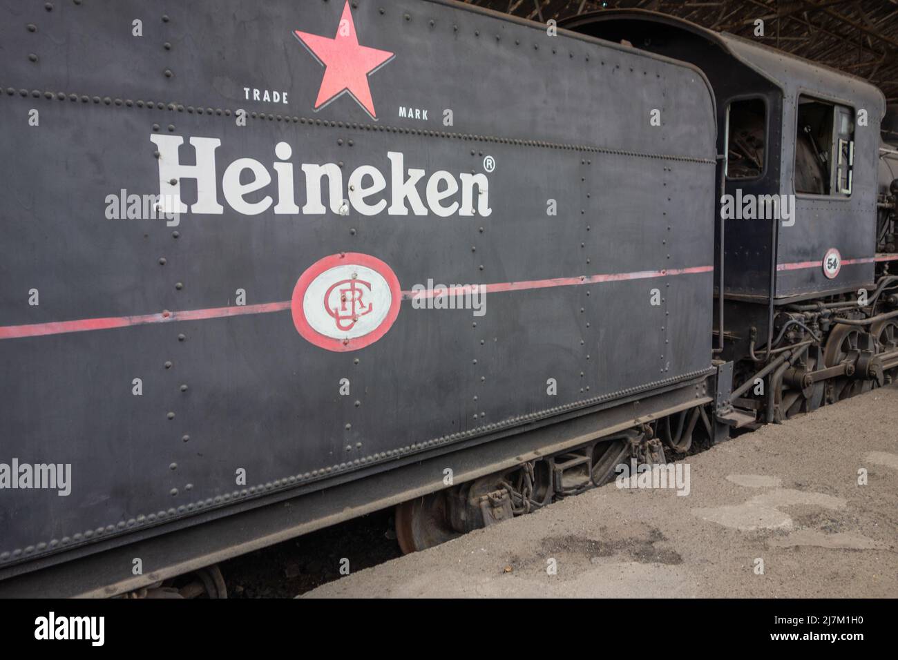 Steam Train in Kingston Georgian railway with 'Heineken' graphic on ...