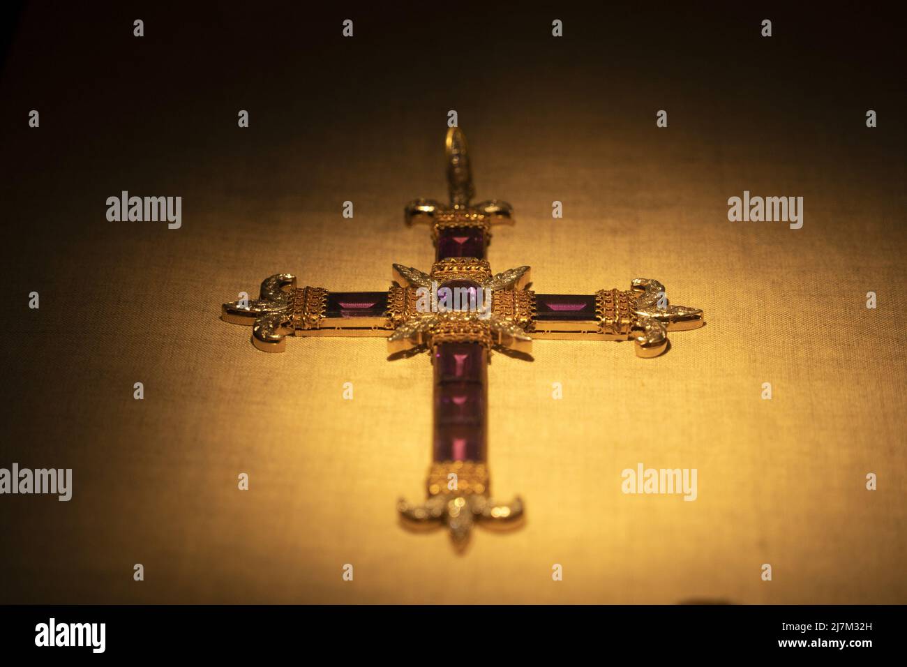 holy gold catholic cross pendant detail Stock Photo - Alamy