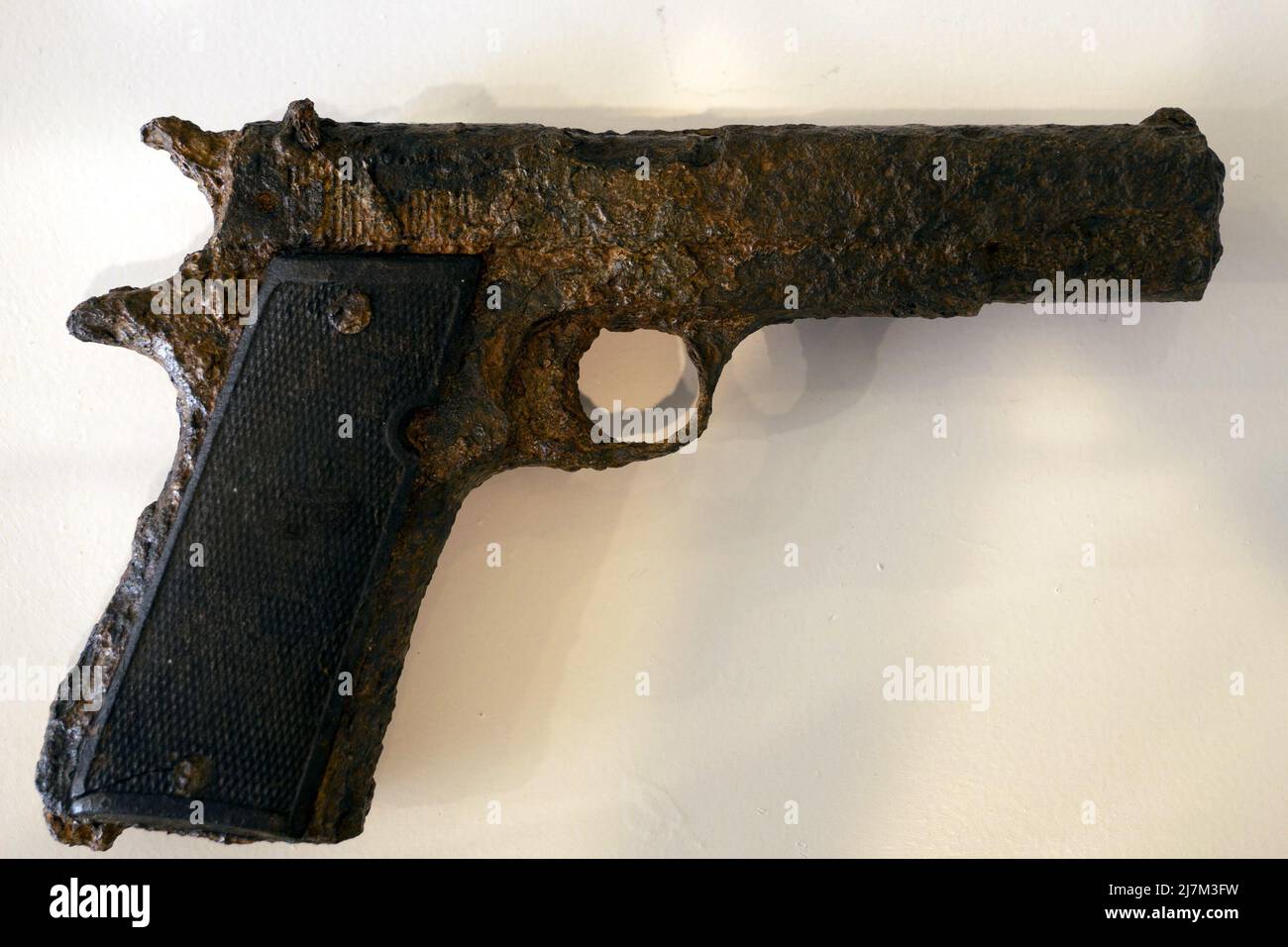 old rusted pistol being underwater for long time on black Stock Photo ...