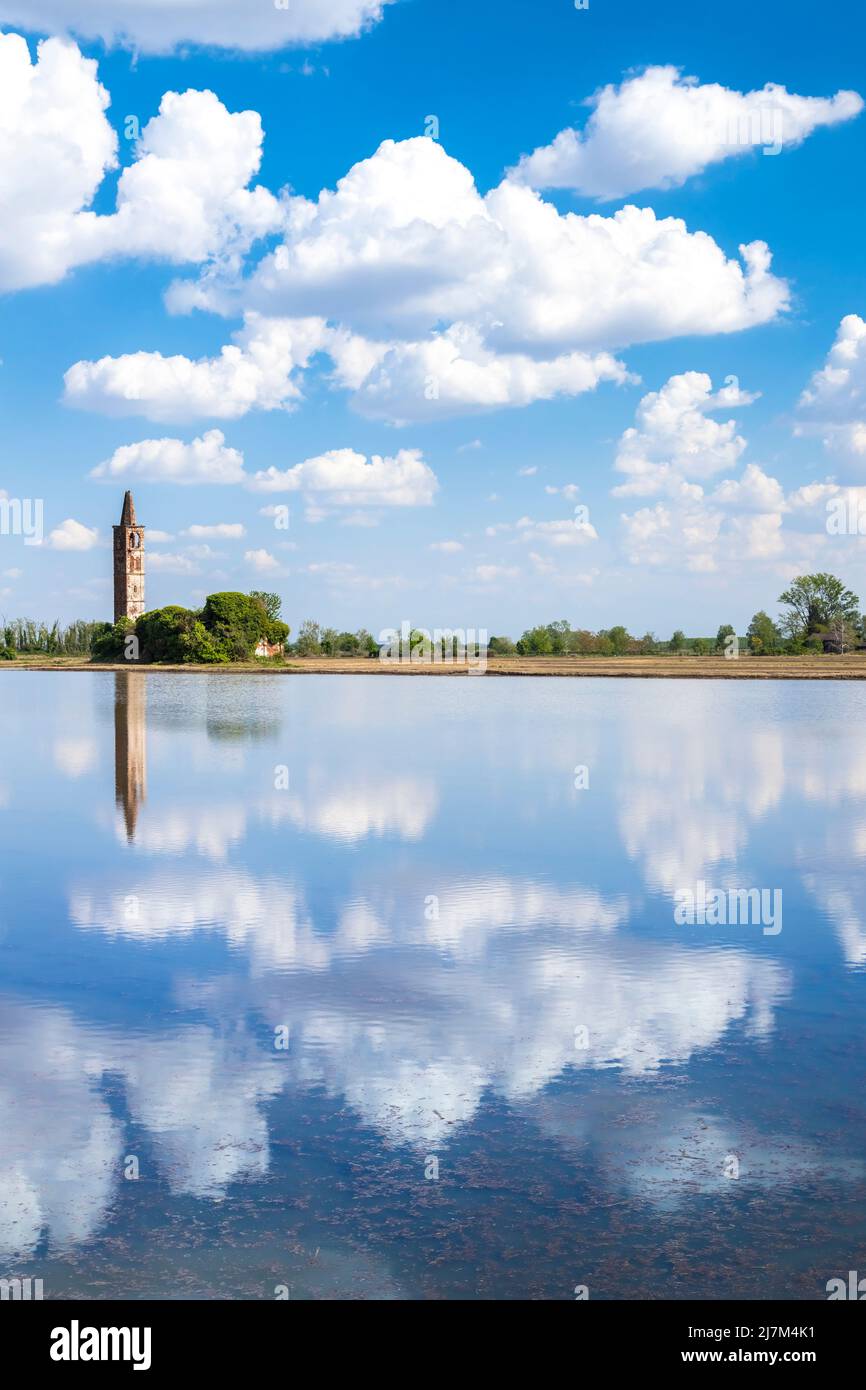 Clouds reflecting over the rice fields and abandoned church of Sant ...