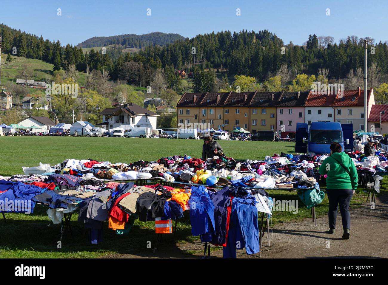 VERKHOVYNA, UKRAINE - MAY 7, 2022 - Clothes are sold at an improvised ...