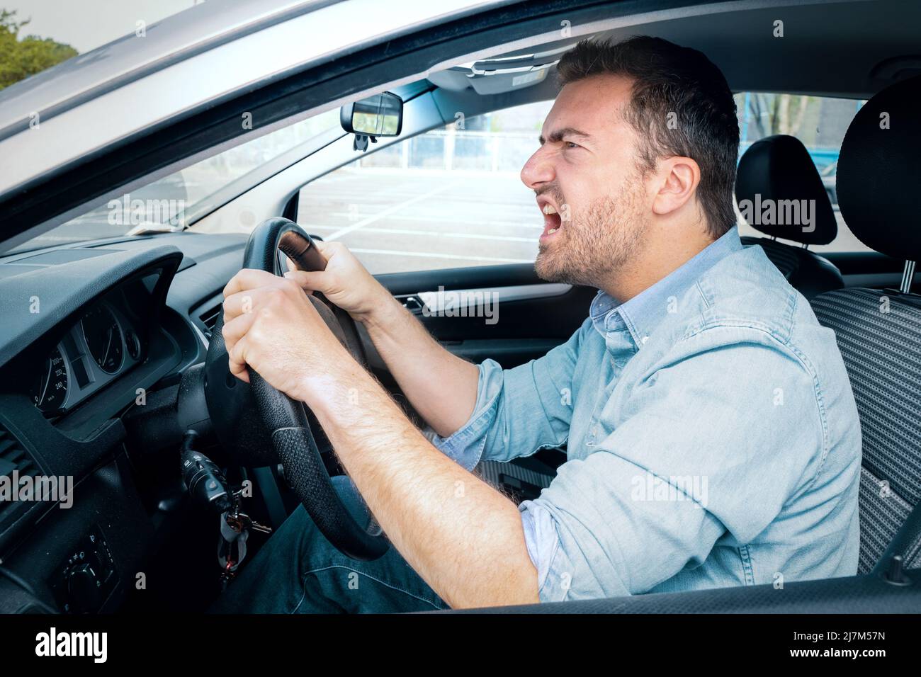 Man driving car yelling hi-res stock photography and images - Alamy