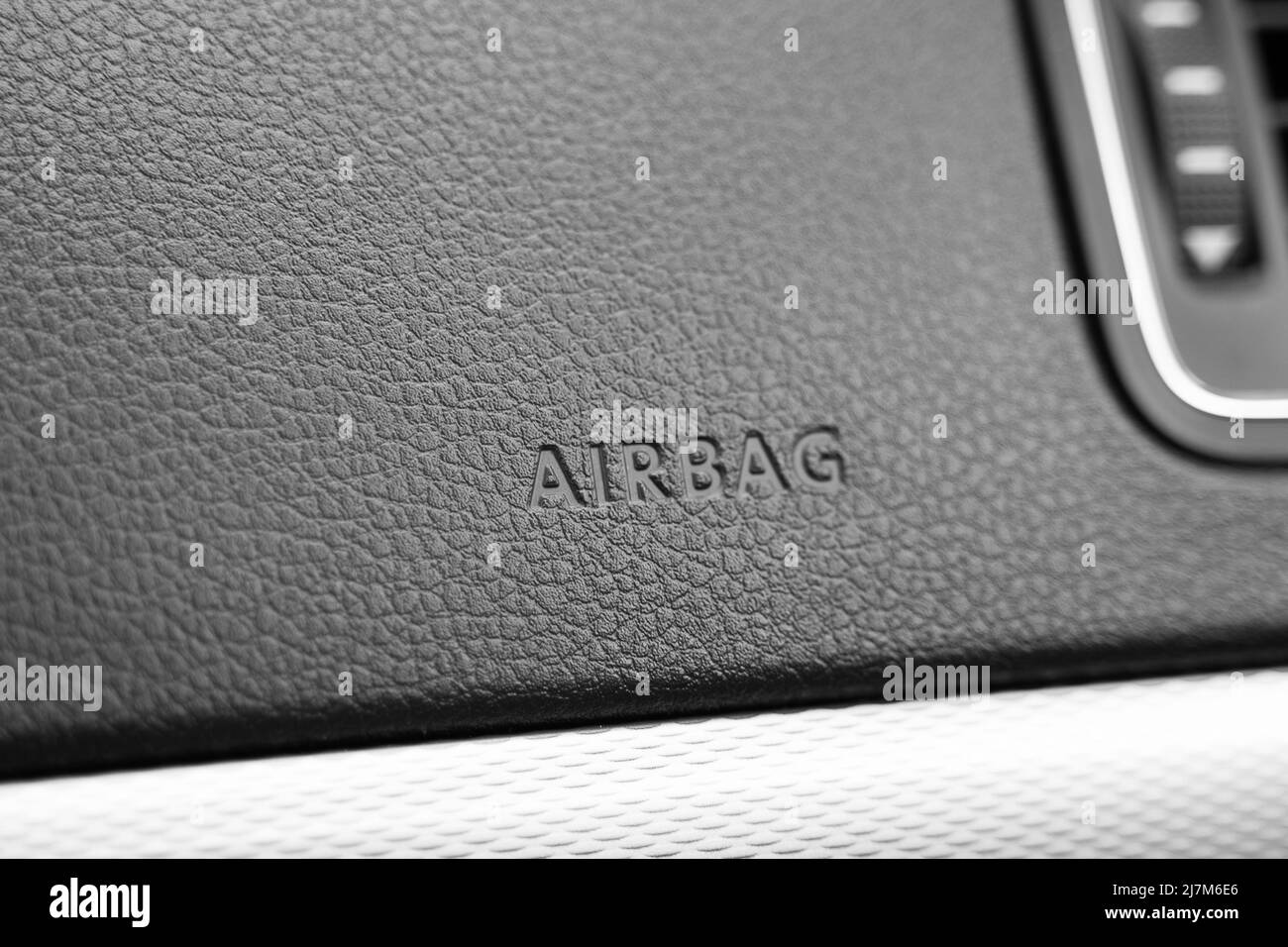 Close Up Of Car Interior Panel With Airbag Sign On It Leather Texture And Safety Bags For Car close-up-of-car-interior-panel-with-airbag-sign-on-it-leather-texture-and-safety-bags-for-car