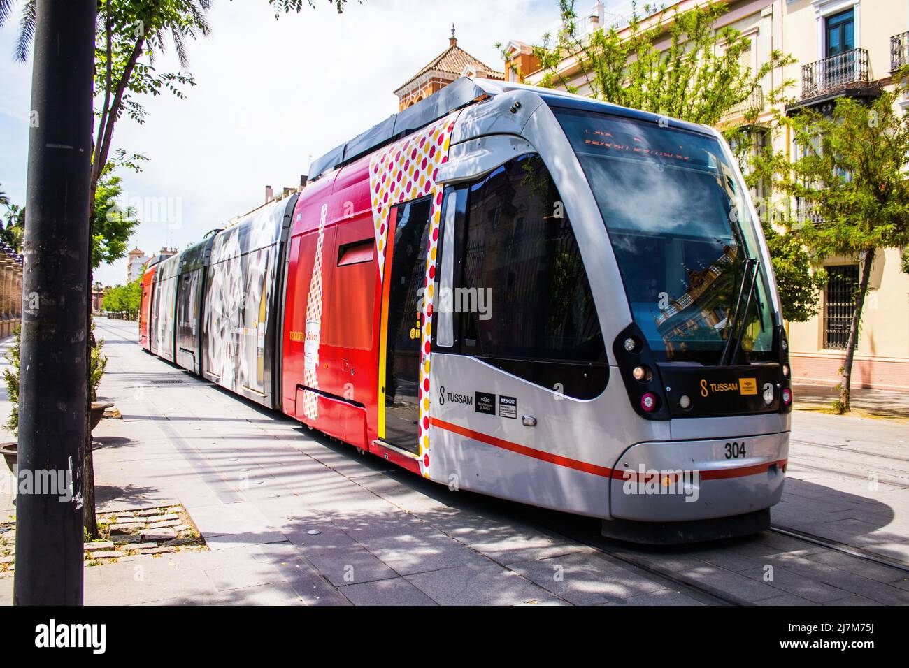 Seville, Spain - May 09, 2022 Modern electric tram for passengers ...
