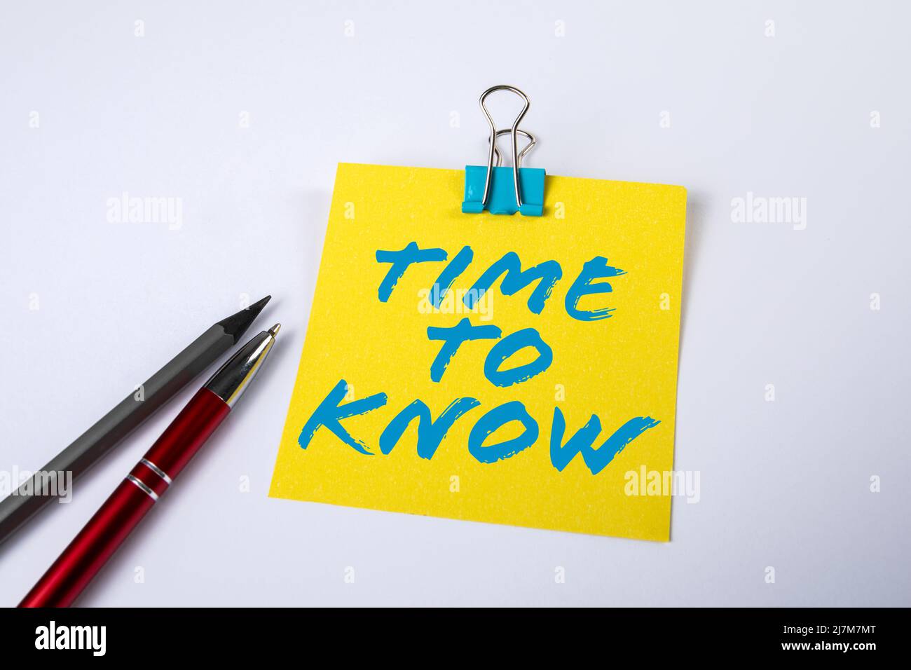 TIME TO KNOW. Sheet of paper and stationery on a white background Stock ...