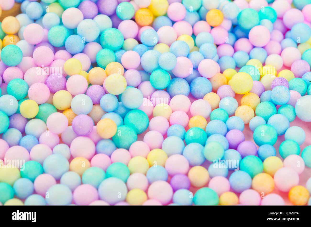 The Foam beads of various colors brightly colored abstract background ...