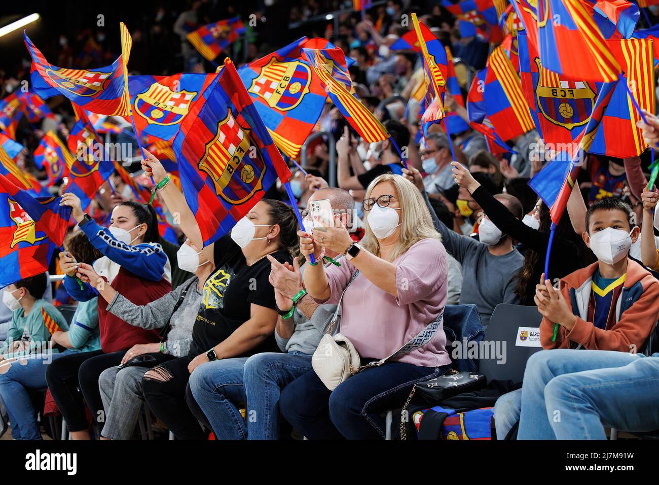 BARCELONA - APR 10: The fans waving Barcelona flags during the ACB ...