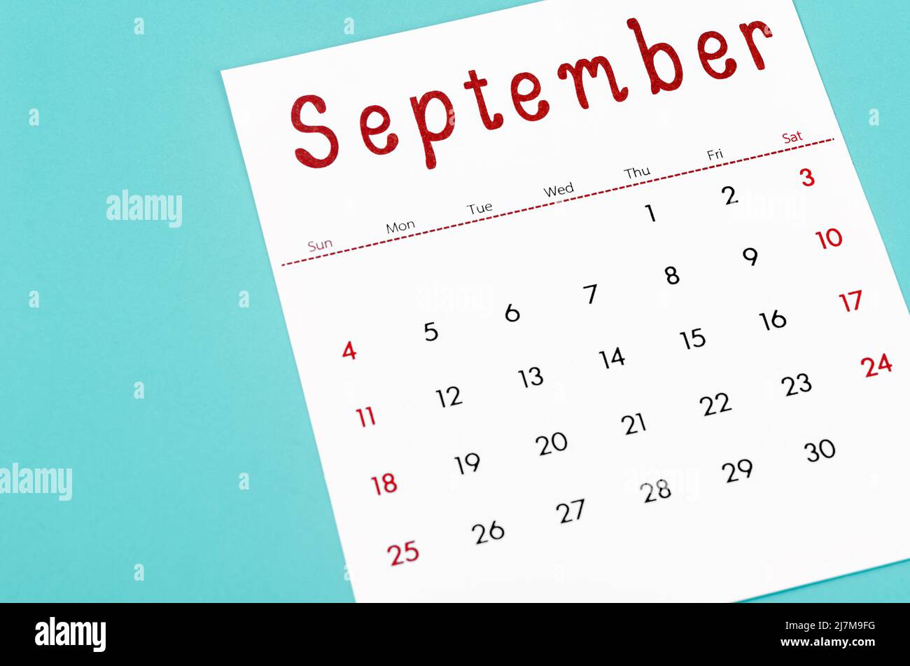 Close up September 2022 calendar sheet on light blue background Stock ...