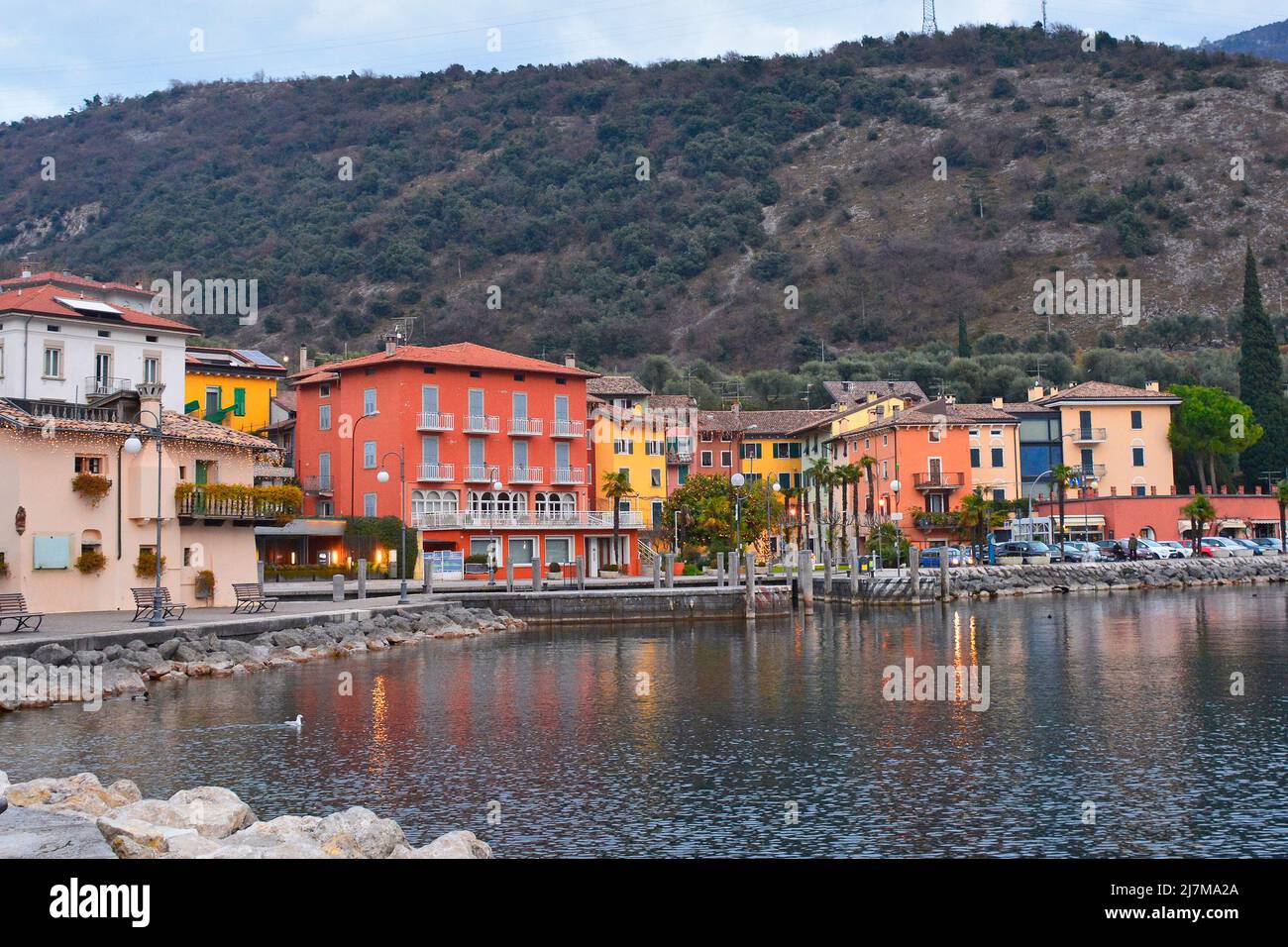 The waterfront of the small Italian town of Torbole on the north east ...