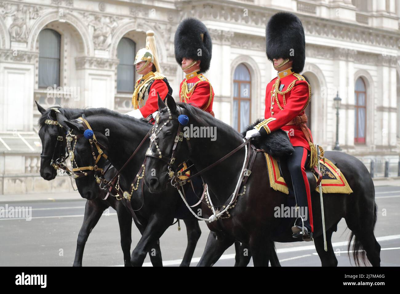 London, UK. 10th May, 2022. Members of the Household Cavalry ride along ...